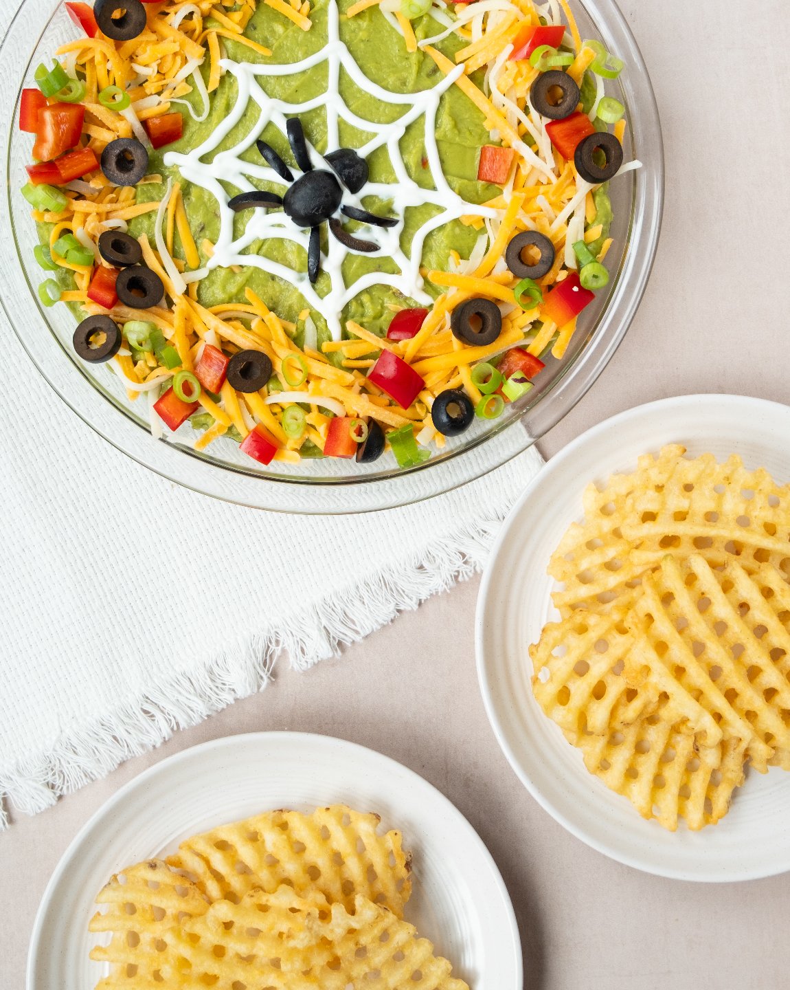 Layered Bean Dip with Waffle Fries Recipe | Cavendish Farms